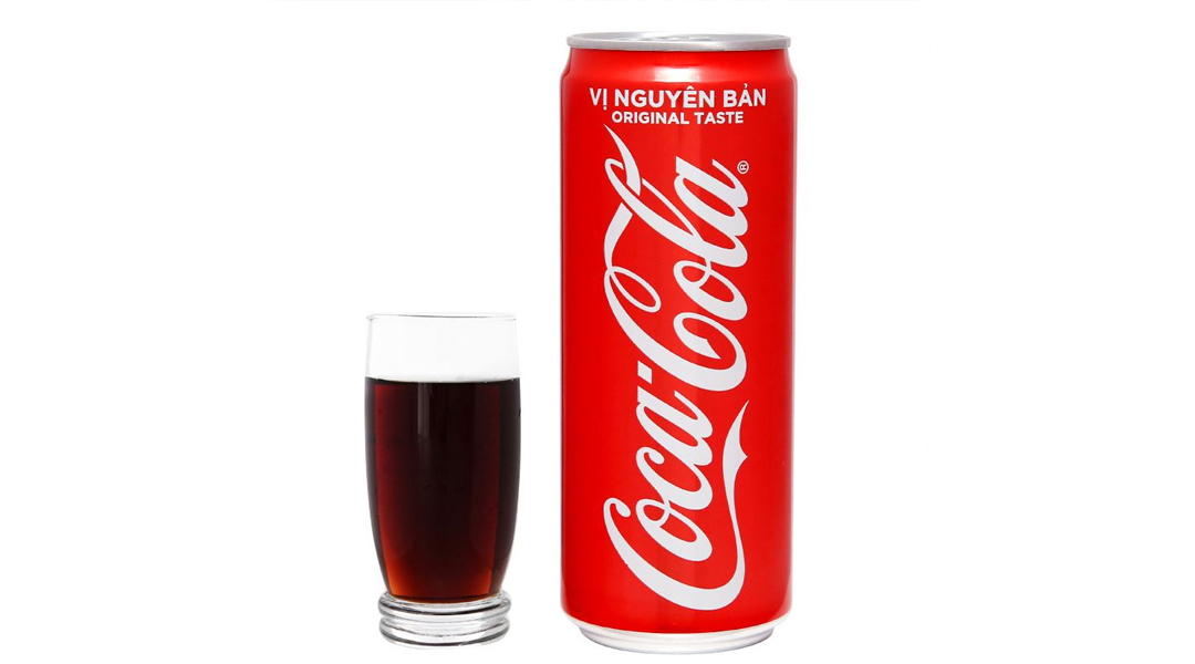 Nước ngọt Coca Cola vị nguyên bản lon 320ml - 08/2025 | nhathuocankhang.com